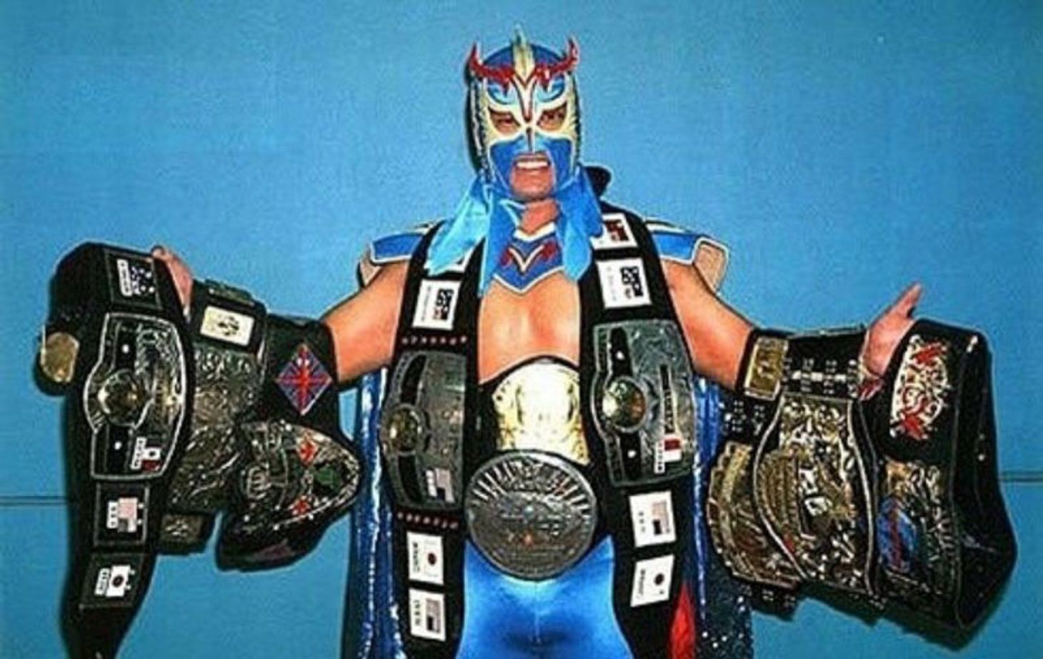 7 WWE Superstars who held three or more titles at the same time
