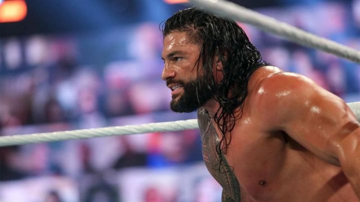 Which NFL team did WWE Superstar Roman Reigns play for?