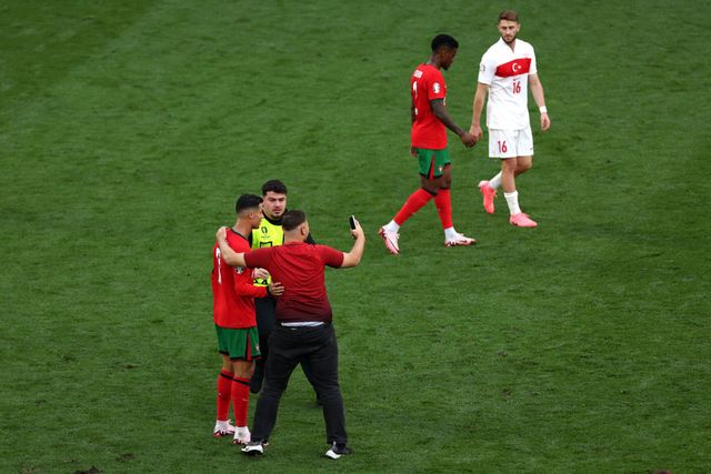 "It's dangerous" - Roberto Martinez hits out at pitch invaders after ...