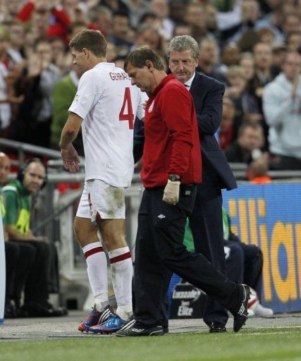England captain Gerrard rues harsh red card